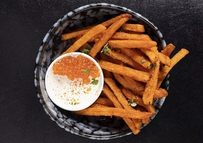 Sweet potato fries with sour cream and red caviar photo # 3