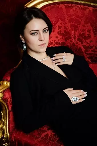 Vassa jumpsuit, Emozioni rings and earrings with aquamarine, Belle Epoque rings and cross, Special necklace classic photo #2